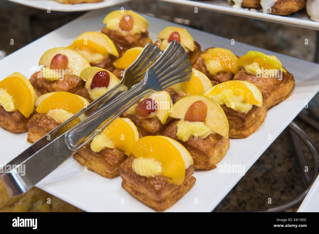 Selection display of sweet pastries food at a luxury restaurant buffet ...
