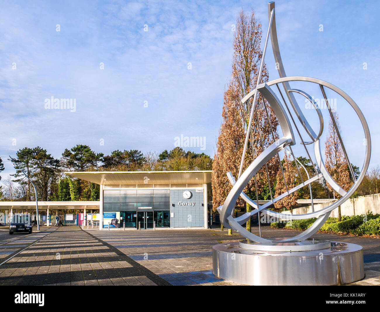 Modern metal sculpture at the East Midlands Corby rail station, England ...