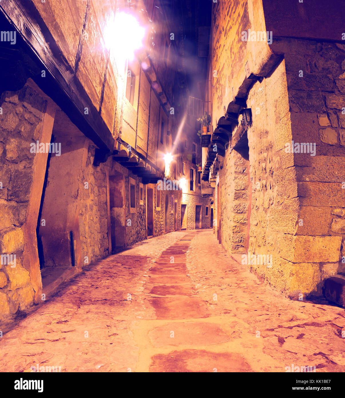 Village street at night.Old cityscape and lamppost Stock Photo - Alamy