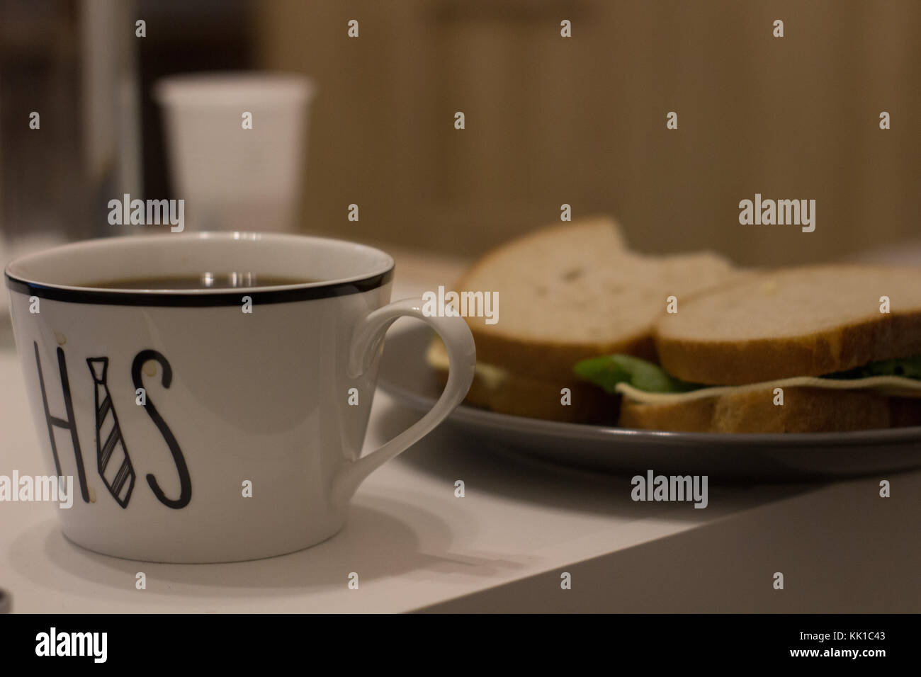 coffee cup and sandwich for breakfast for two Stock Photo - Alamy