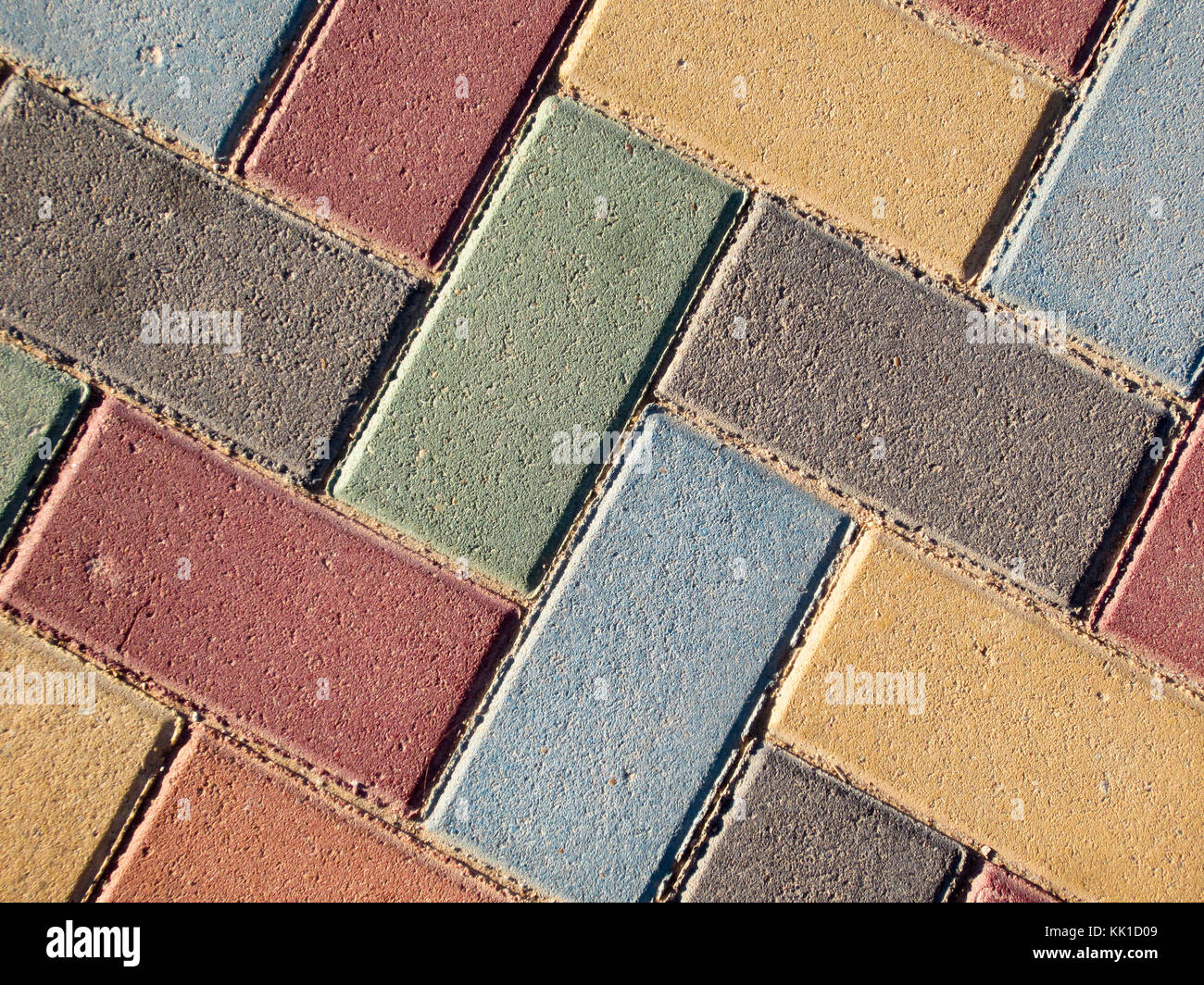 multi coloured brick pavement on Spanish walkway Stock Photo - Alamy