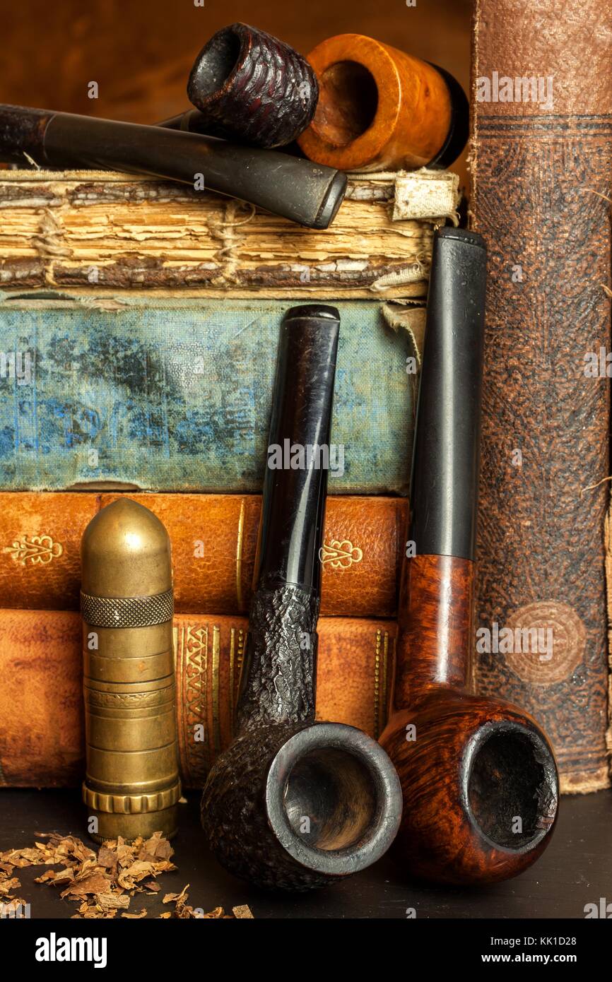 Reading a book and smoking pipe hi-res stock photography and images - Alamy