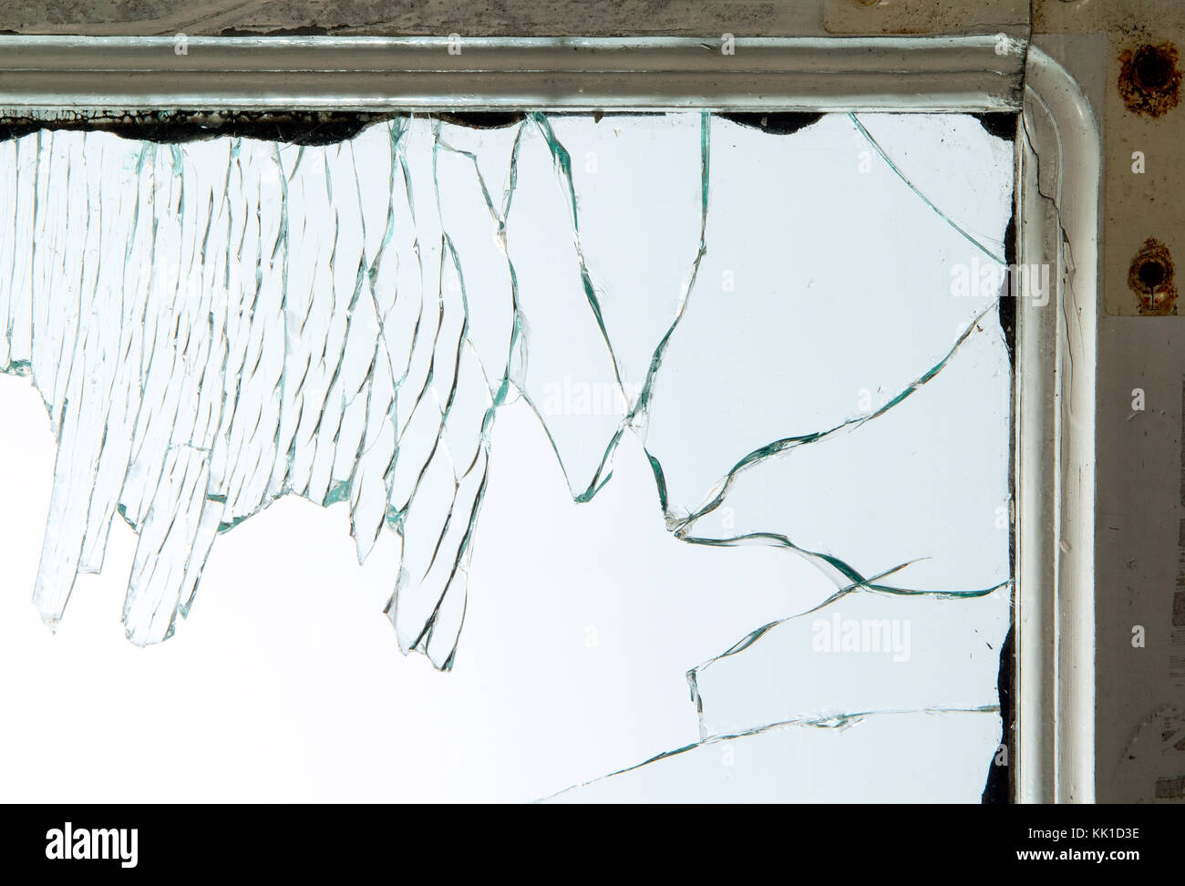 Broken window glass with wooden vintage frame around Stock Photo - Alamy