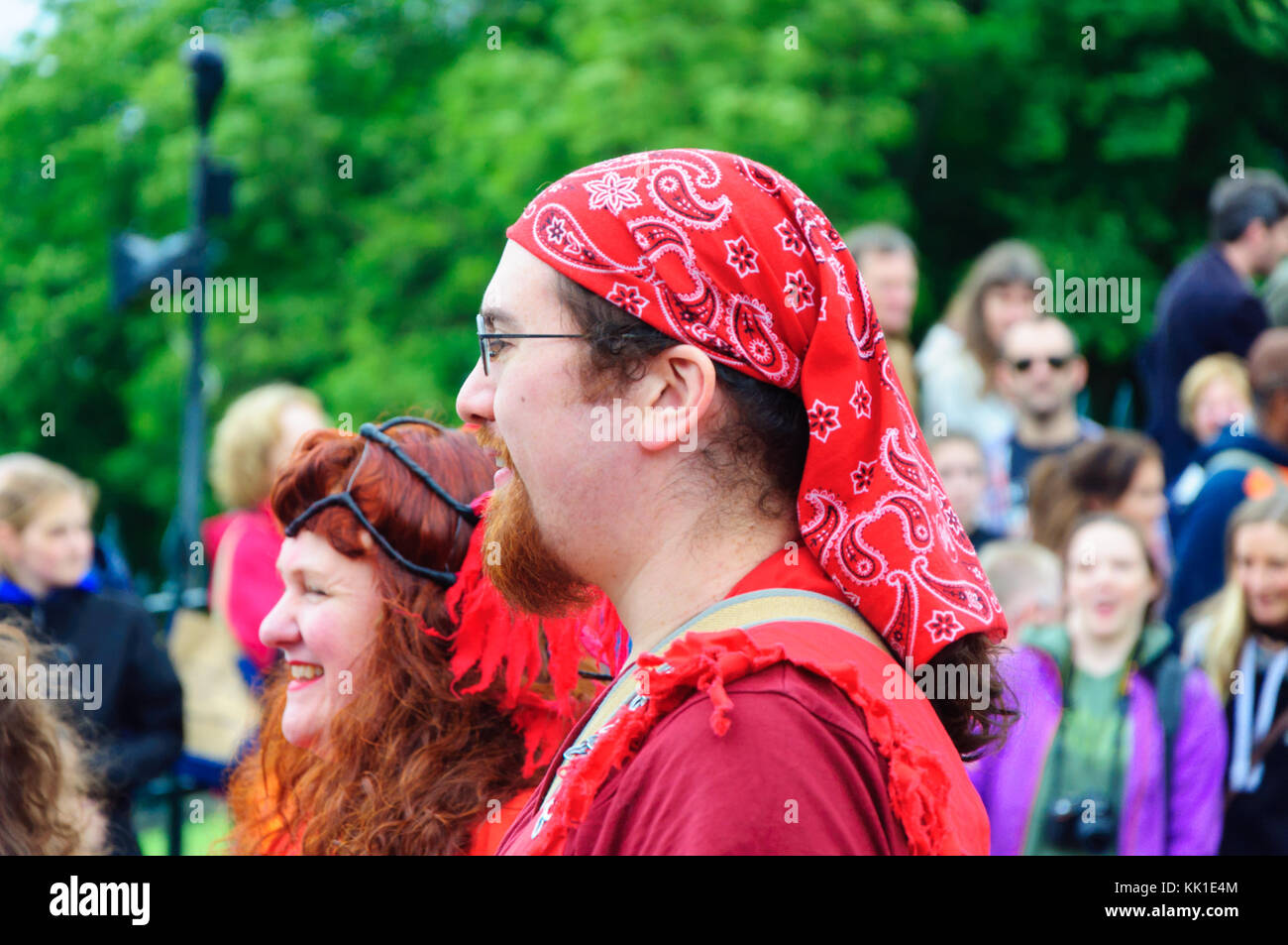Male performer with beard, head scarf and glasses in the Carnival of ...