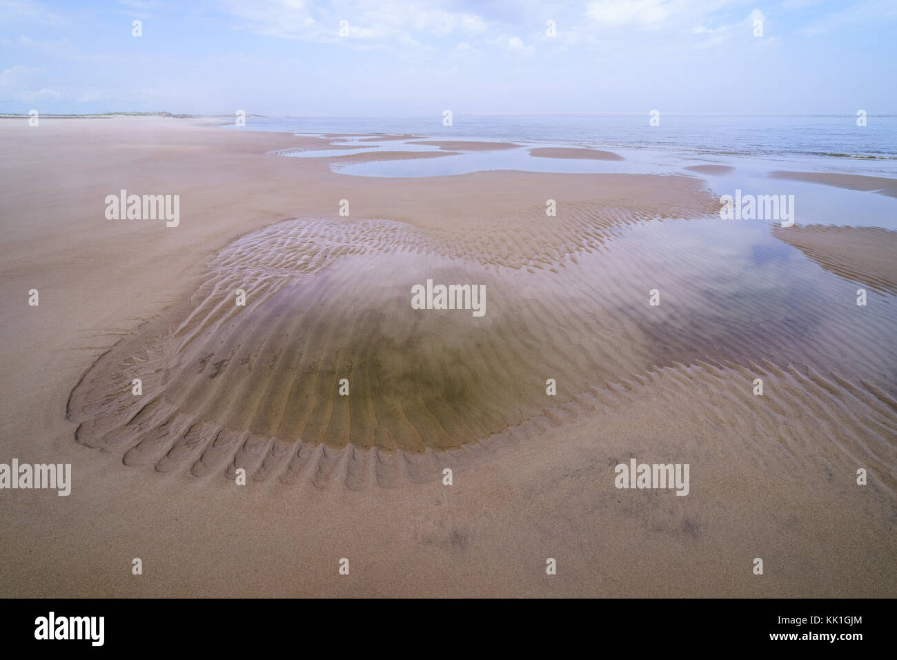 Sandy shore of the sea in the north of Sakhalin Island, Russia ...