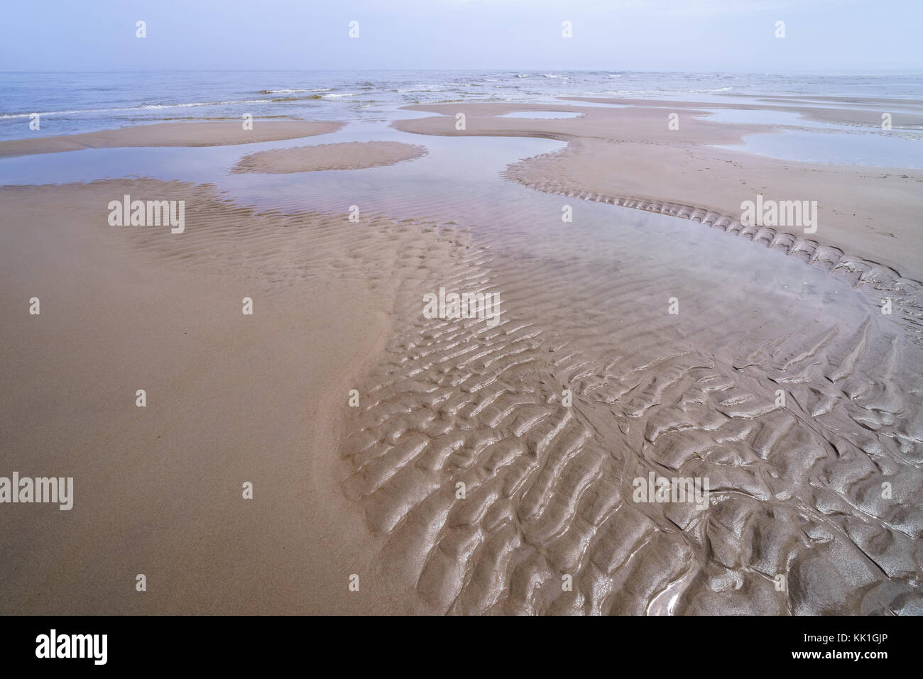 Sandy shore of the sea in the north of Sakhalin Island, Russia ...