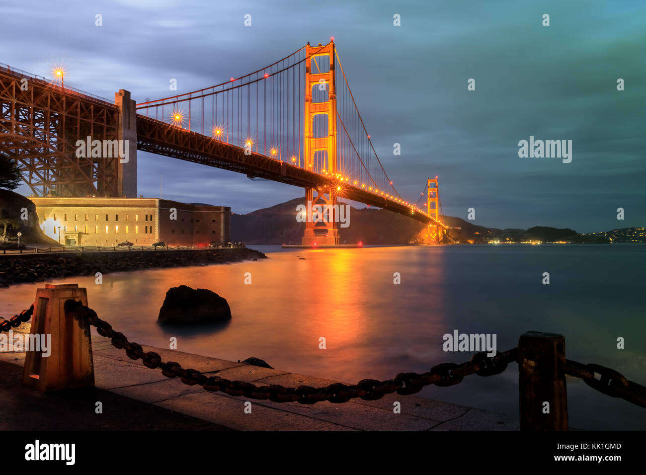 Golden Gate Bridge and chain link fence at Night Stock Photo - Alamy