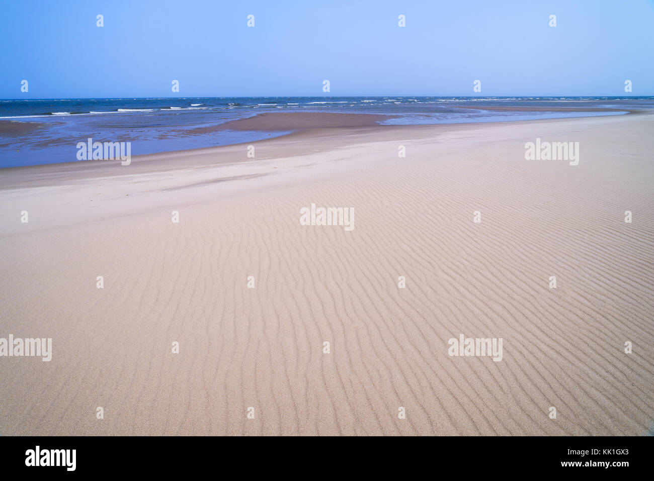 Sandy shore of the sea in the north of Sakhalin Island, Russia ...