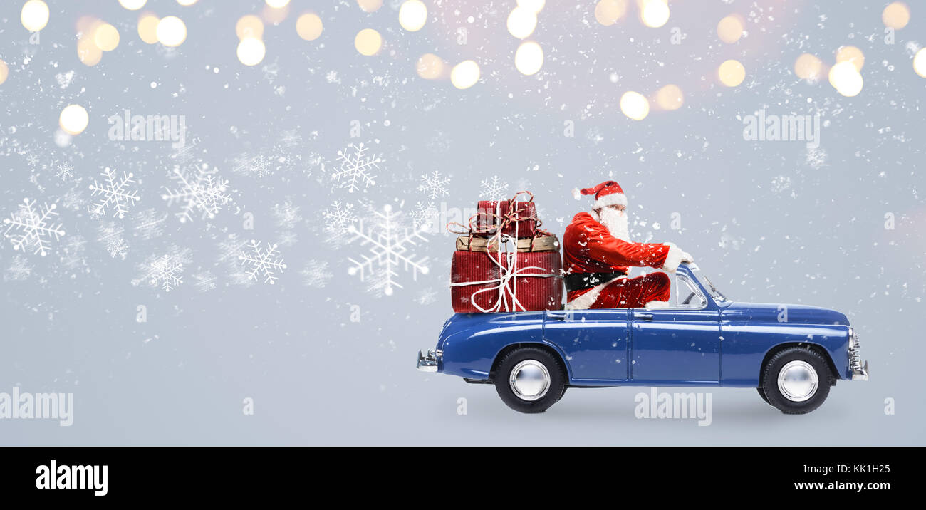 Santa Claus on car Stock Photo - Alamy