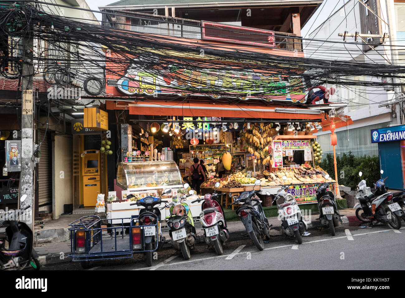 Retail shops on Chaweng, Koh Samui, Thailand. Showing the power cables ...