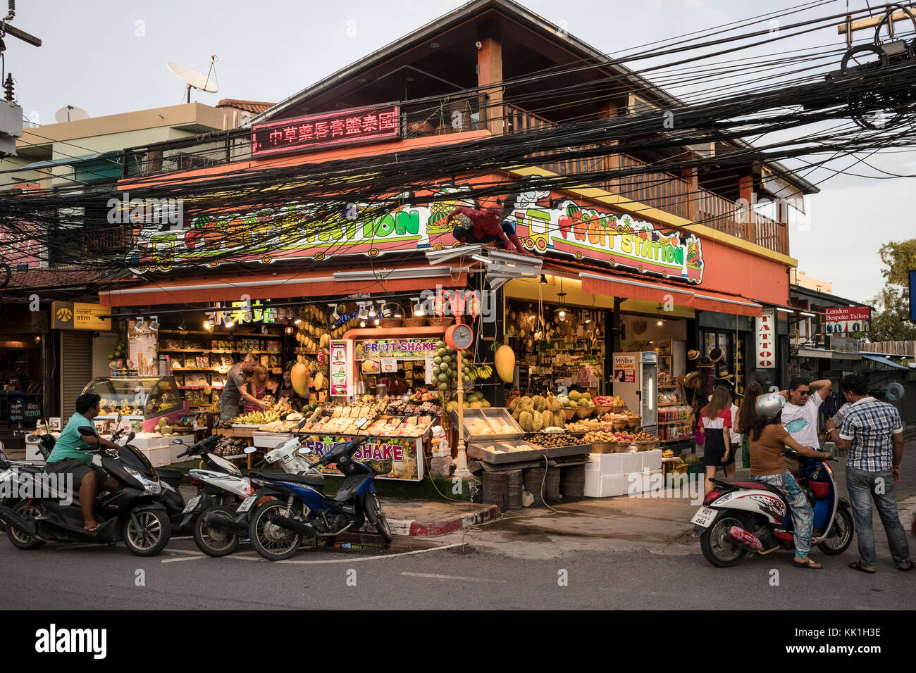 Retail shops on Chaweng, Koh Samui, Thailand. Showing the power cables ...