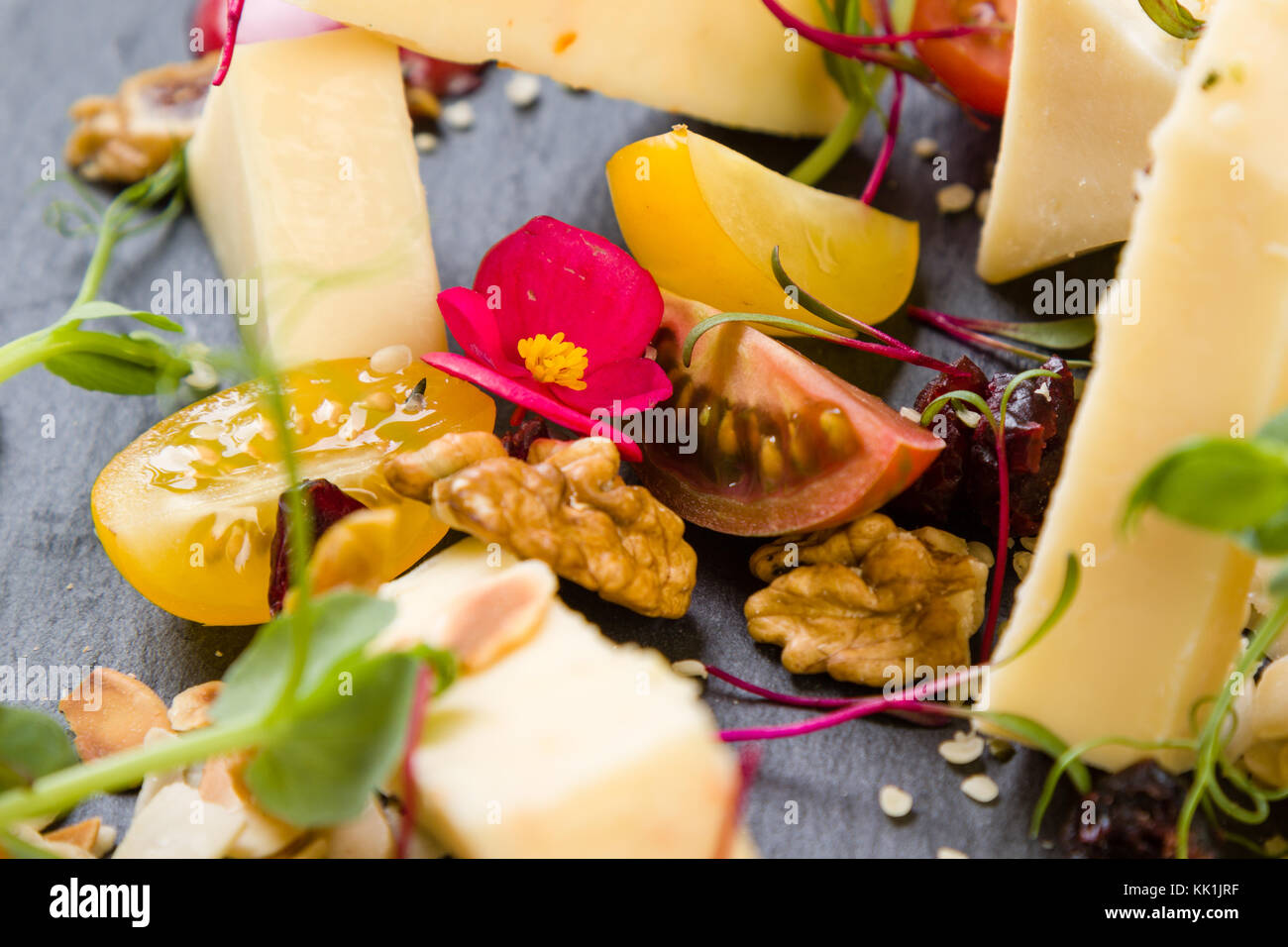 gourmet cheese platter with different types of cheese Stock Photo - Alamy