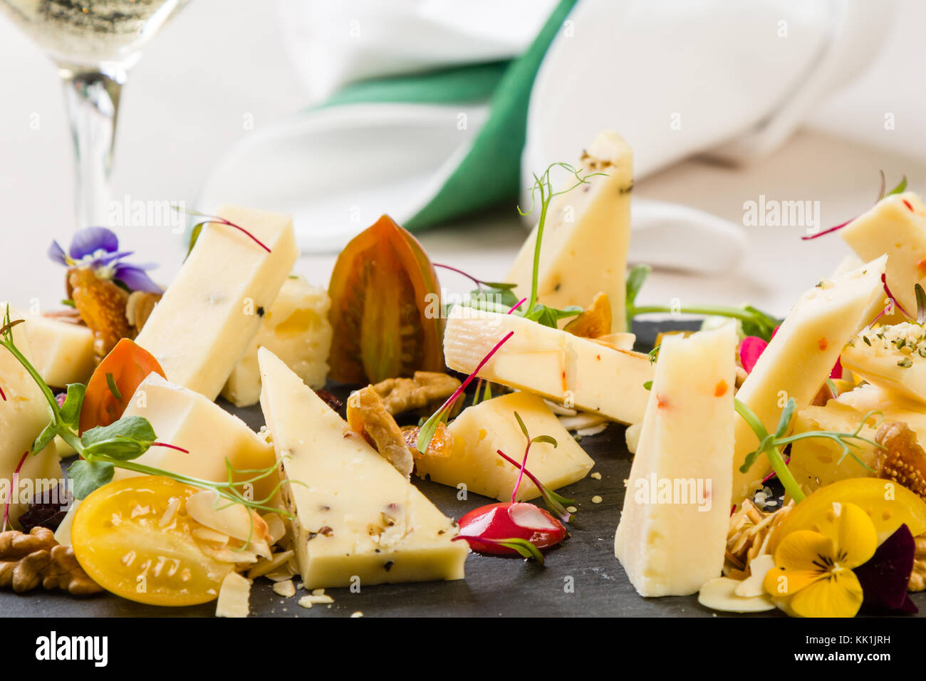 gourmet cheese platter with different types of cheese Stock Photo - Alamy