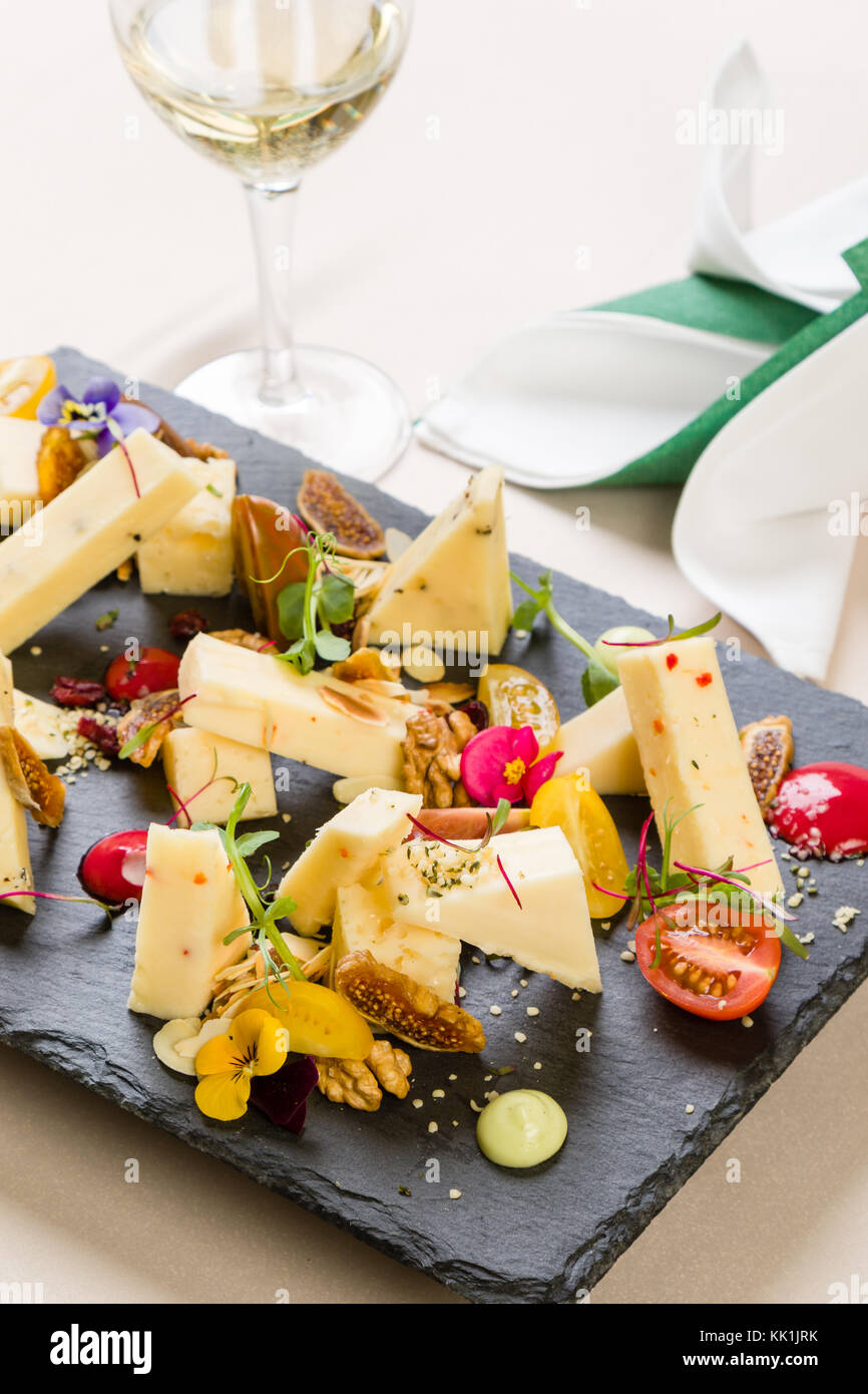 gourmet cheese platter with different types of cheese Stock Photo - Alamy