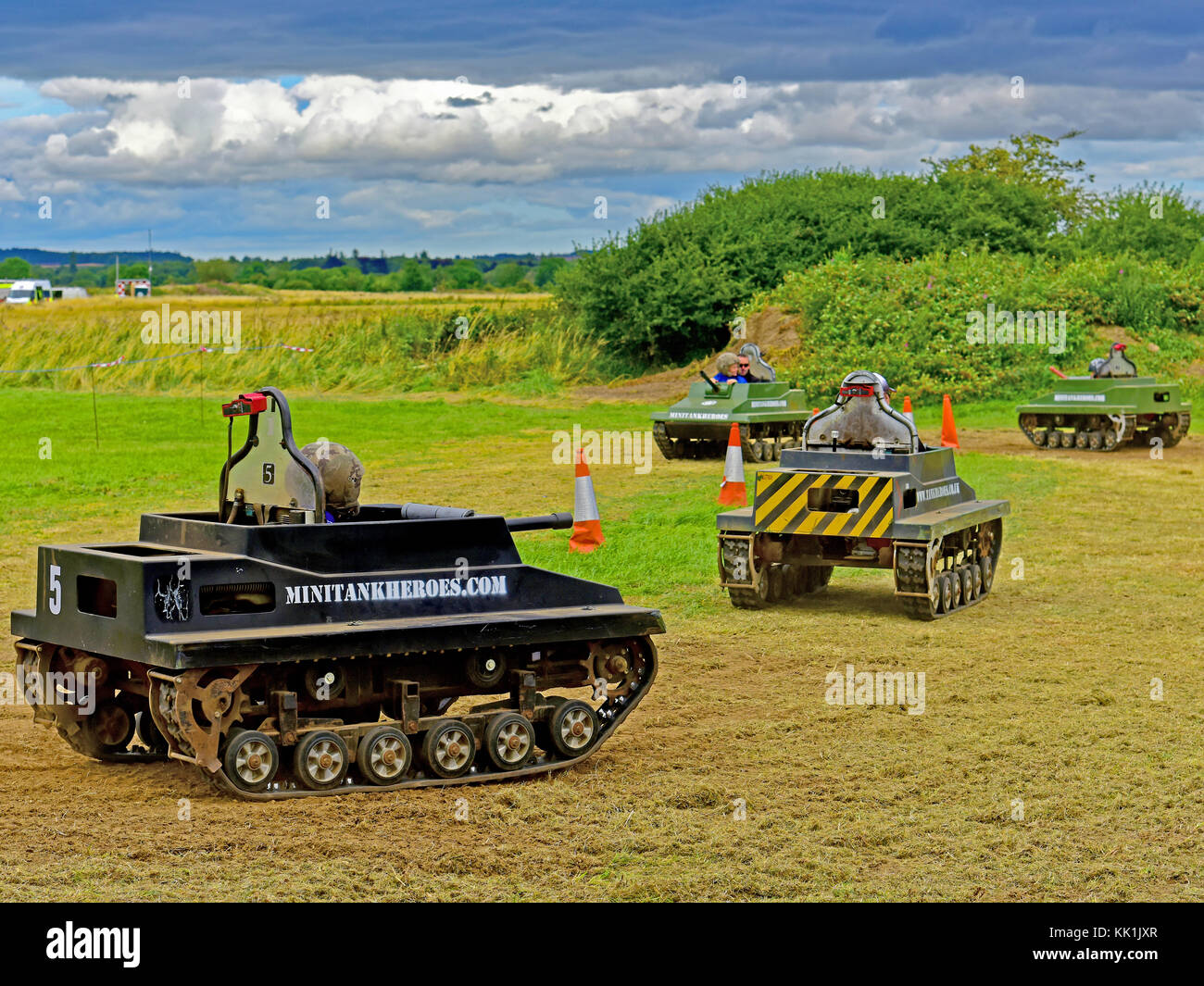 Mini tanks for boys power around an assault course in Northumberland ...