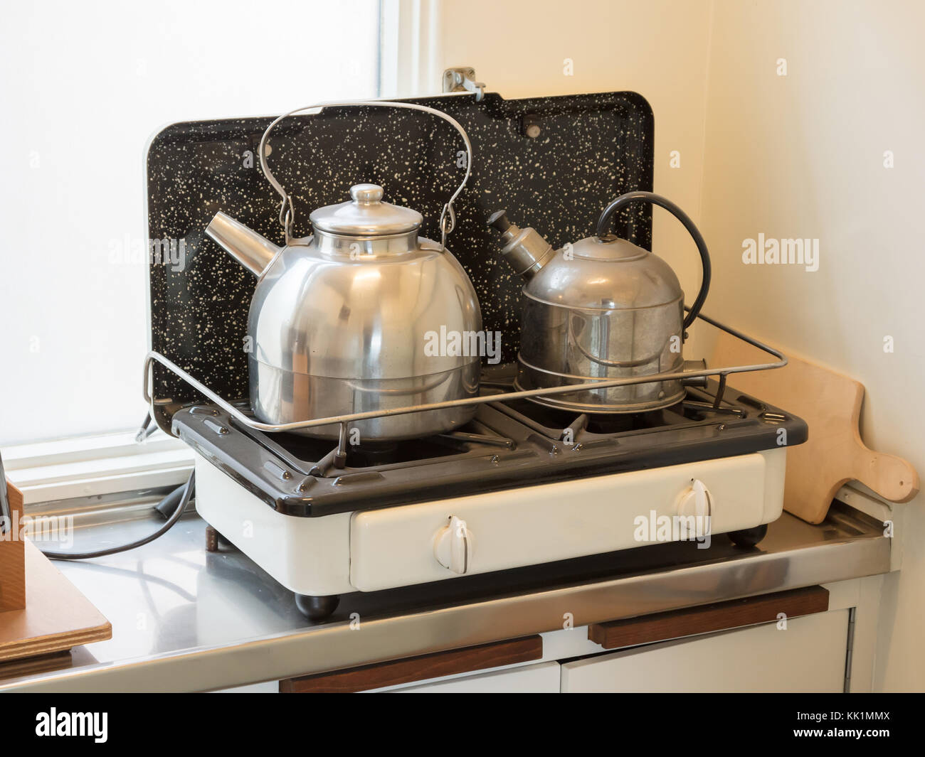 Simple teapot in a kitchen in a vintage train Stock Photo - Alamy