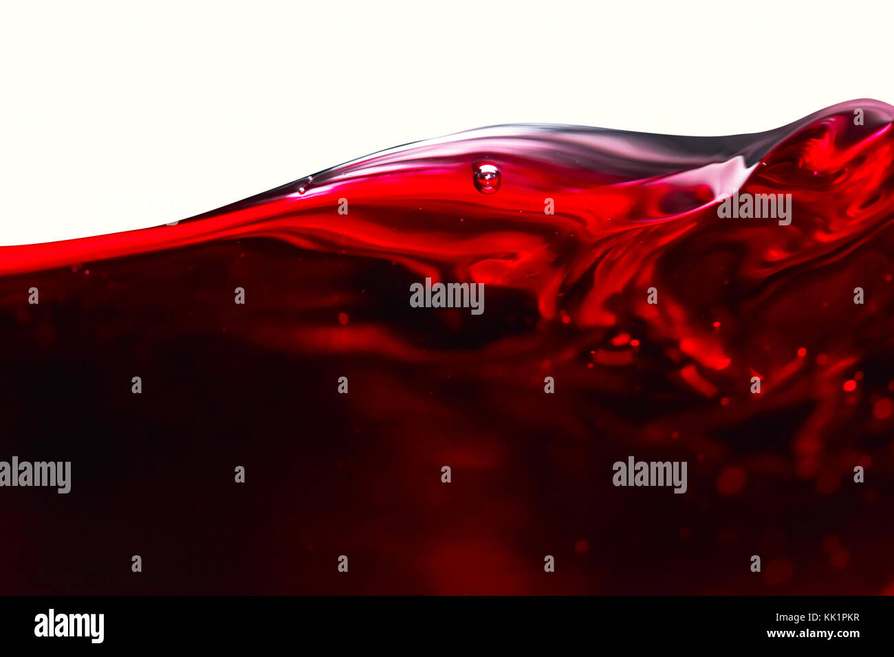 Red wine isolated on white background , abstract splashing , saved ...