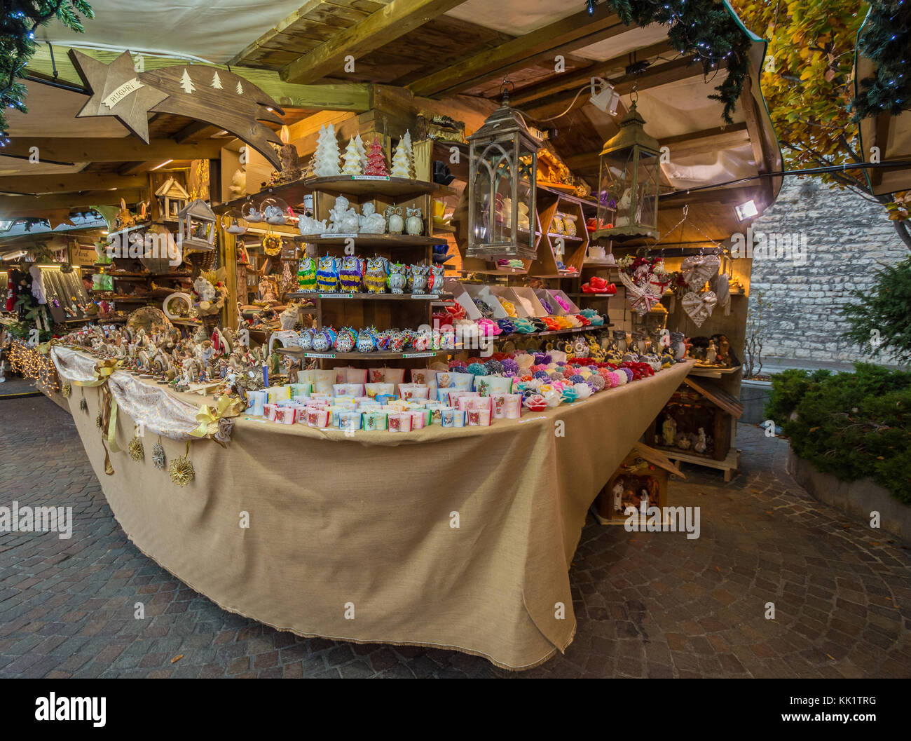 The colorful christmas market in Trento city in the evening. Trentino ...