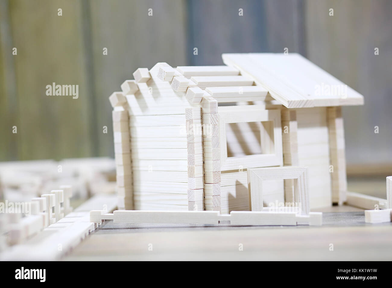 Toy wooden house. The constructor is made of natural wood for children ...