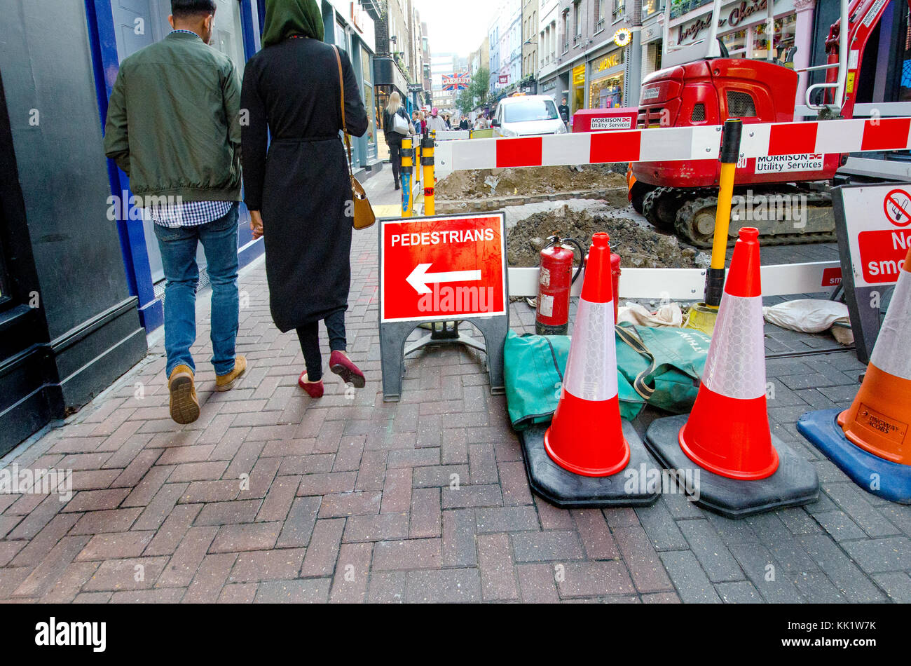 London, England, UK. Roadworks causing disruption to pedestrians in ...