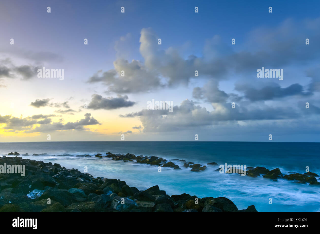 Beach with waves crossing against the rocks off of San Juan, Puerto ...