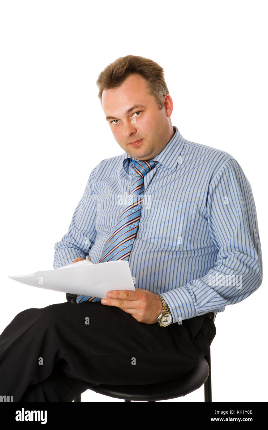 Portrait of Businessman reading papers isolated on white Stock Photo ...