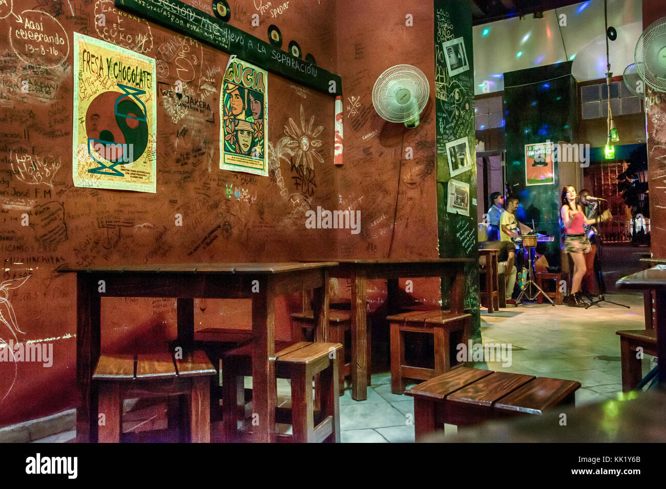 A band plays traditional salsa and rumba music in a typical restaurant ...