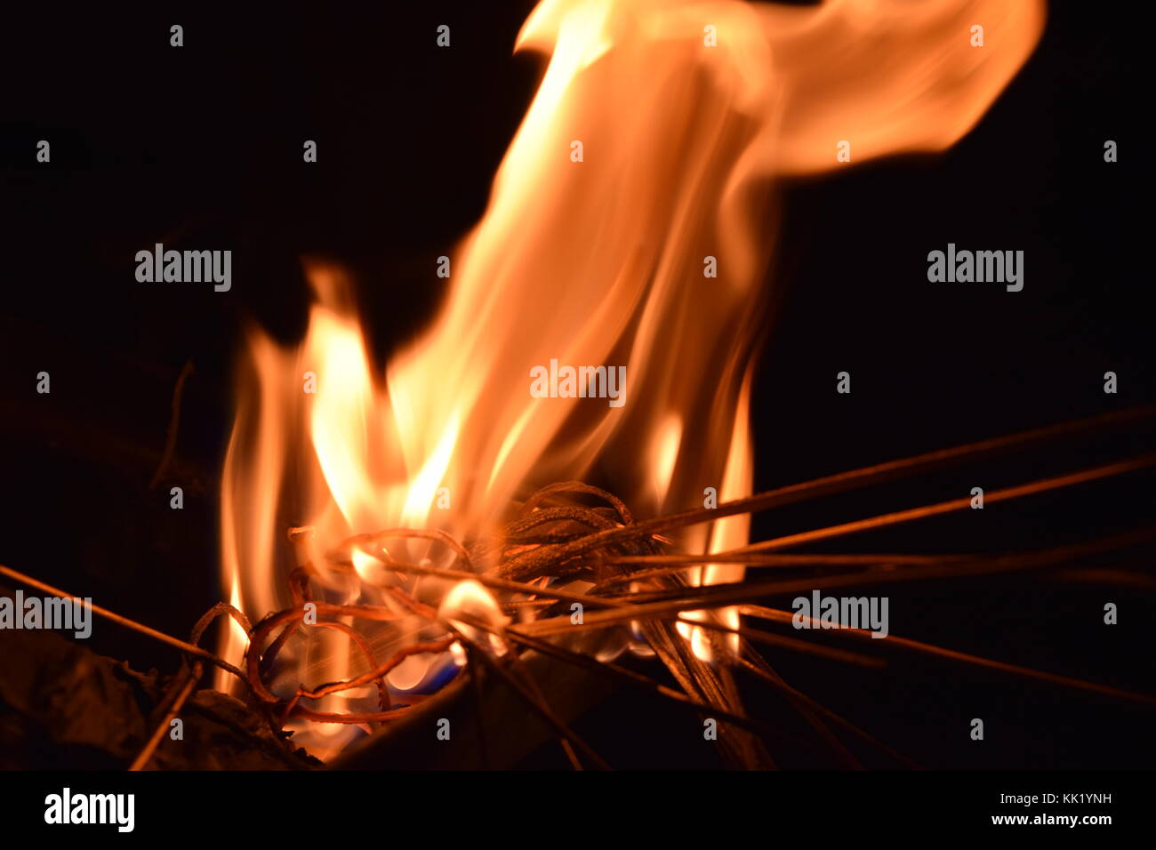 Flame, burning sticks, glass-like flames Stock Photo - Alamy