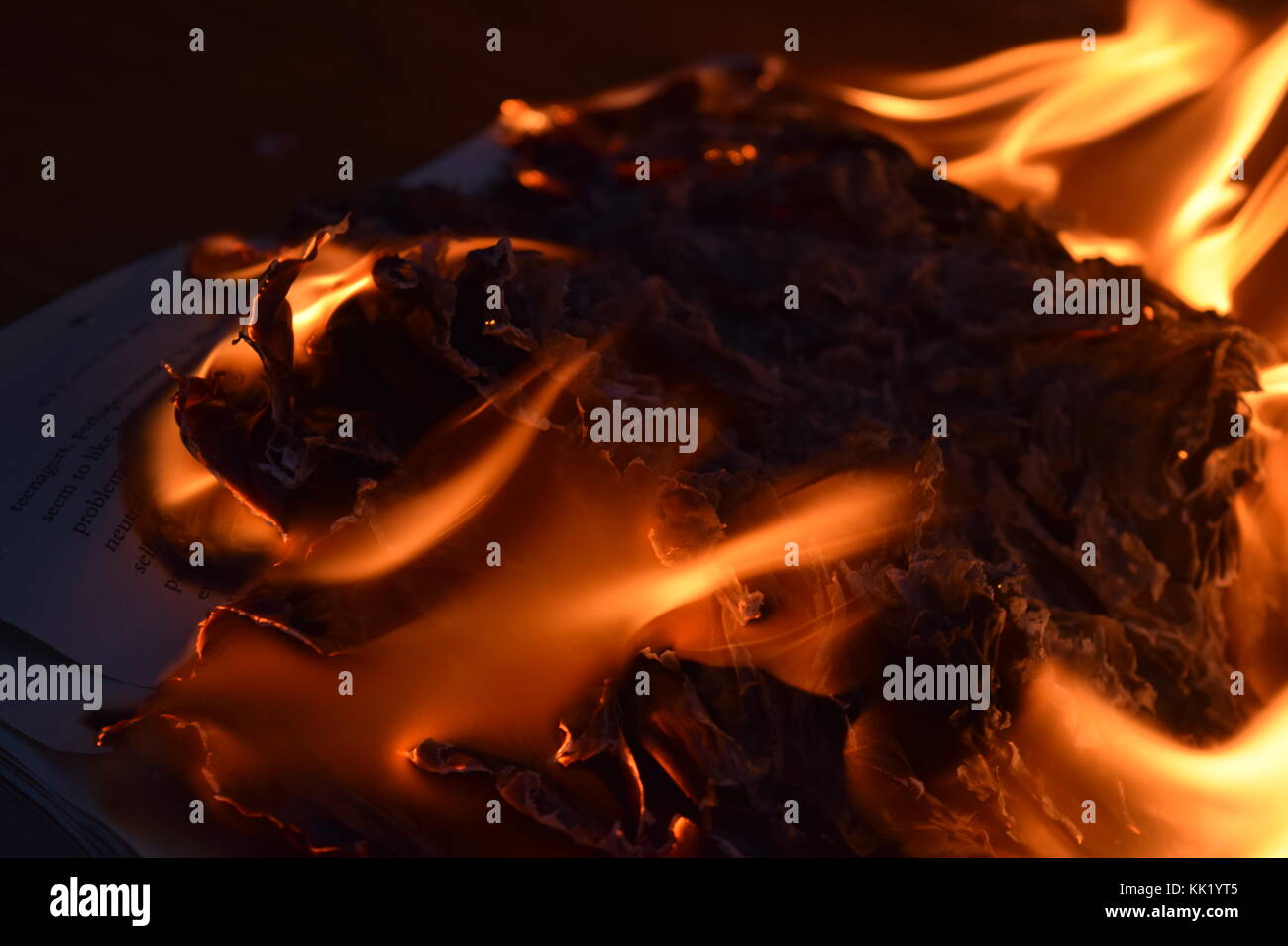 Book burns bright flame hi-res stock photography and images - Alamy