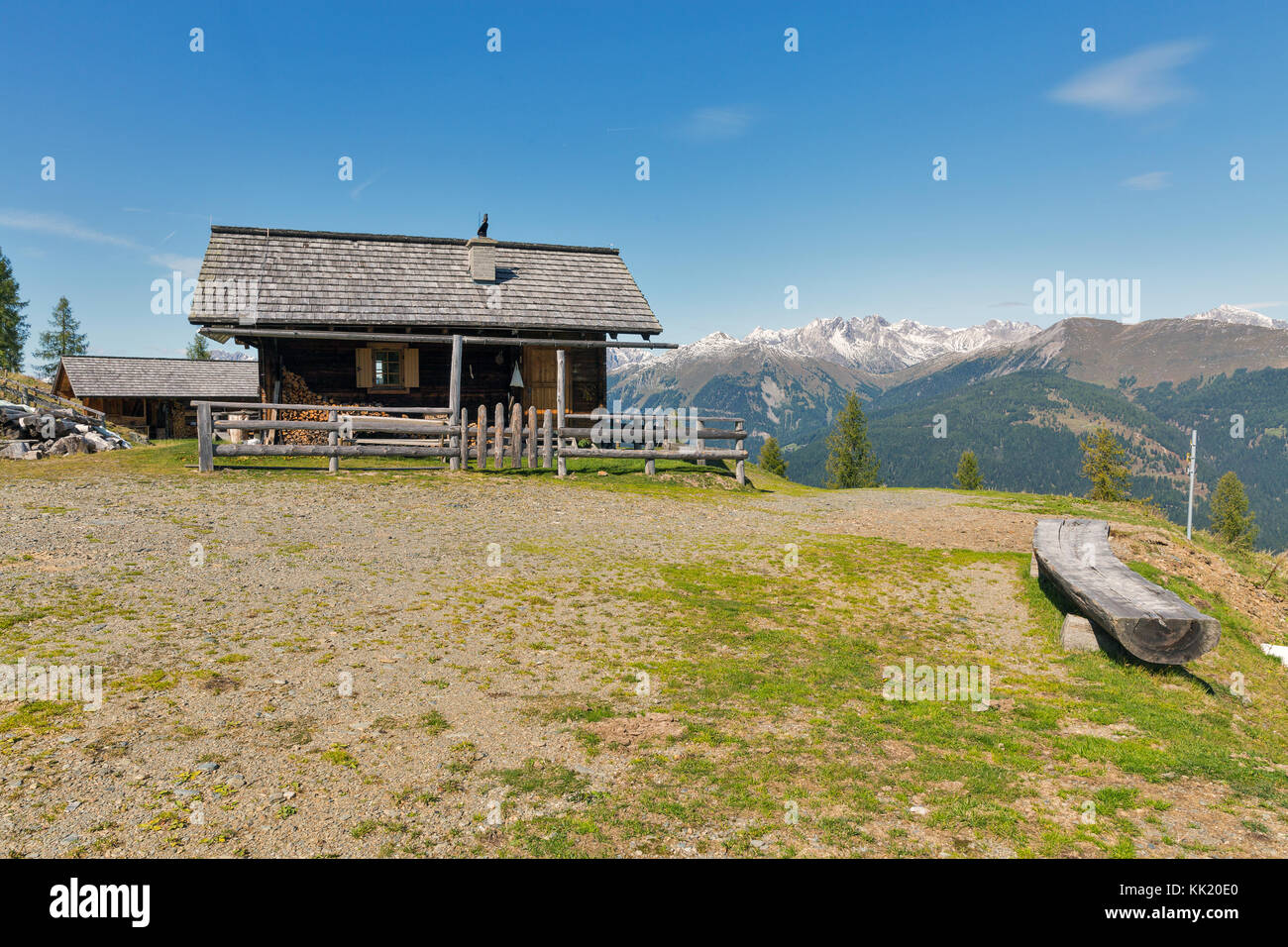Wooden shepherd lodge on a highland pasture with Alpine mountain ...