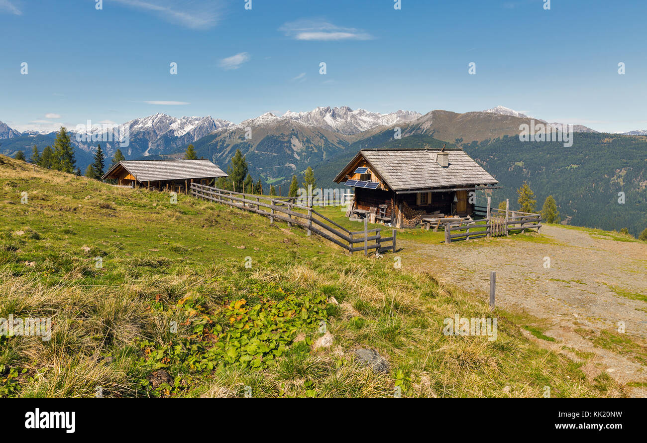 Wooden shepherd lodge on a highland pasture with Alpine mountain ...
