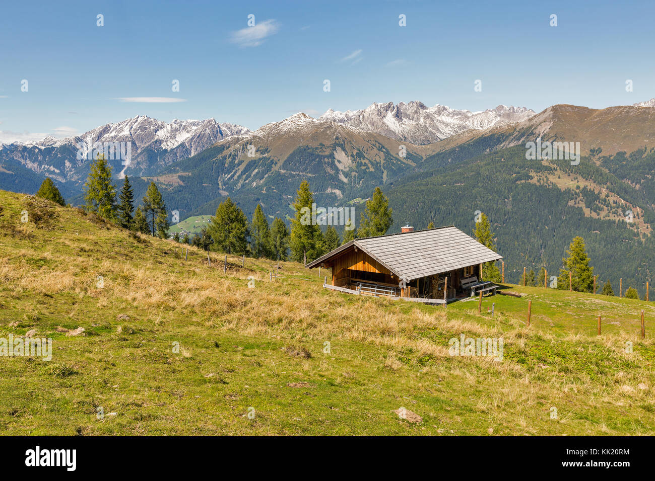 Wooden shepherd lodge on a highland pasture with Alpine mountain ...