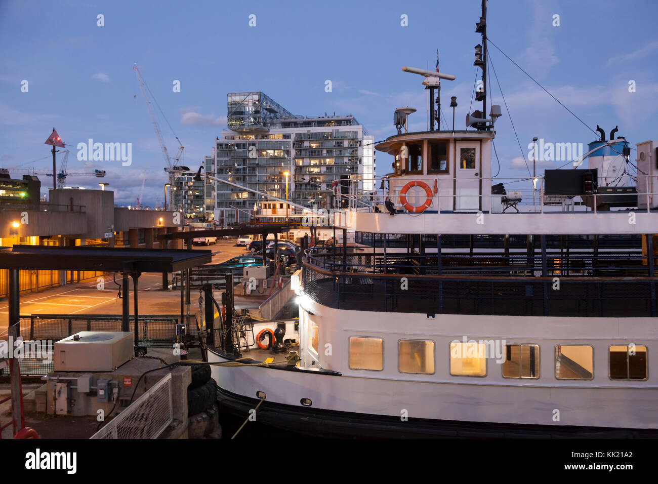 Centre Island ferry boat in Toronto illuminated at dusk. The ferry ...