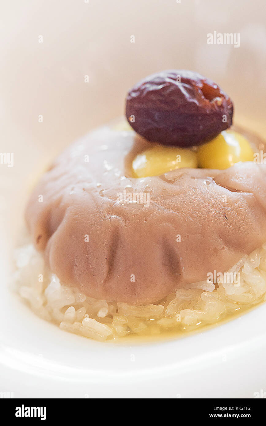 Chinese dessert, Chinese hot sticky rice and taro with ginkgo in sweet ...