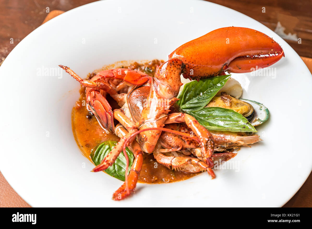 Pastis Grilled Halved Lobster Tails with mussel calamari Stock Photo ...