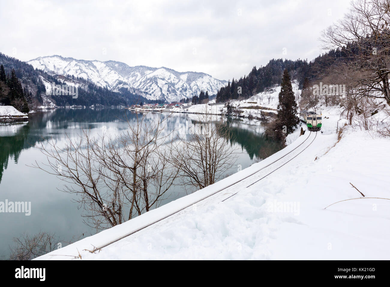Train in Winter landscape snow on bridge Stock Photo - Alamy