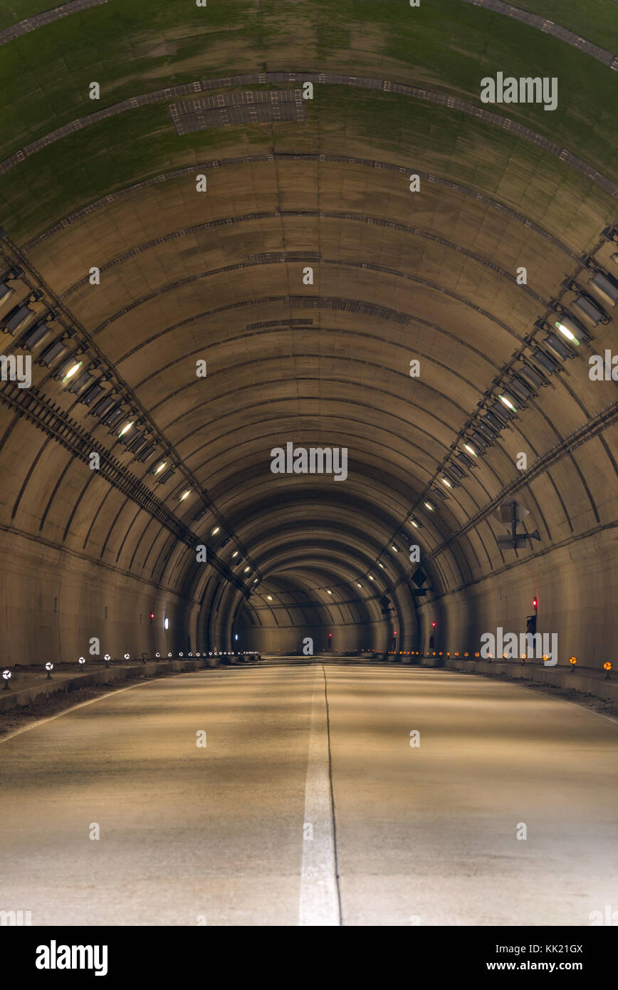 Tunnel Road with two lane highway Stock Photo - Alamy