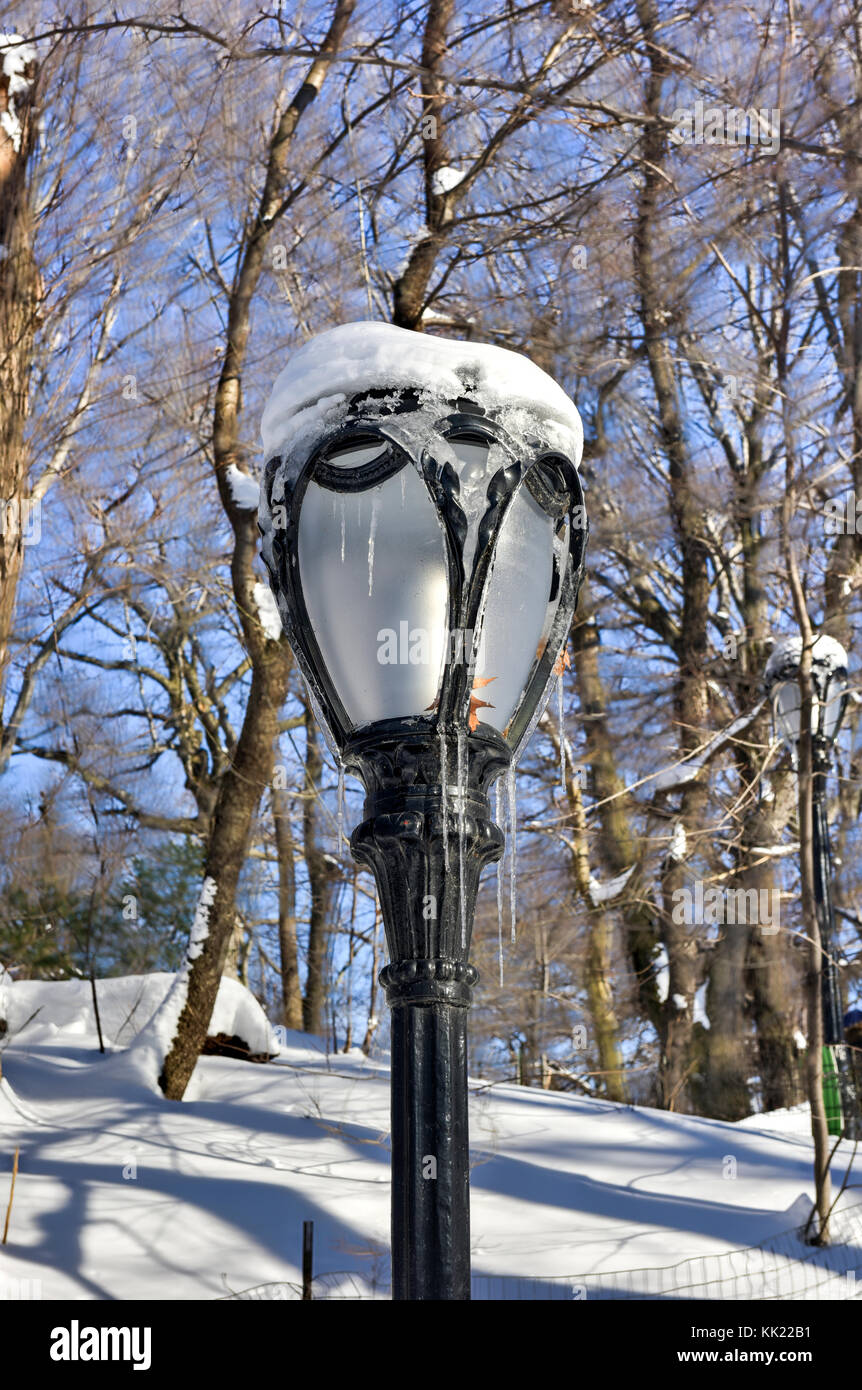 Frozen Central Park lamp post in New York City after a snow storm Stock ...