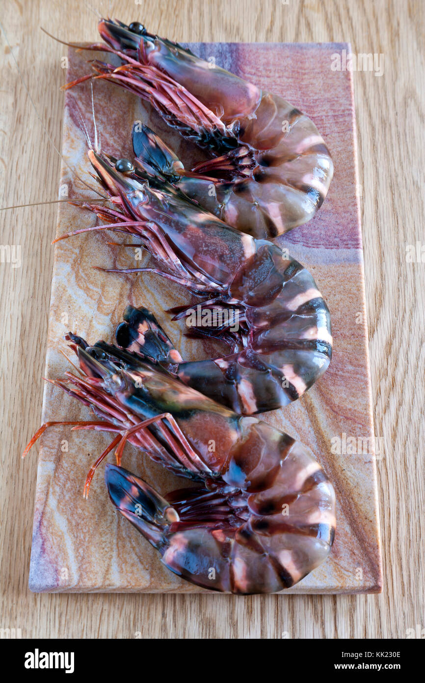Large black tiger prawns in shells hi-res stock photography and images ...