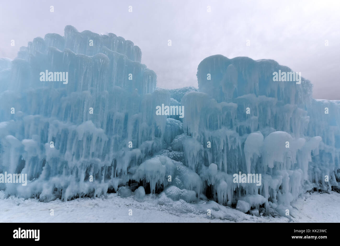 Translucent blue icicles in a frozen ice wall Stock Photo - Alamy