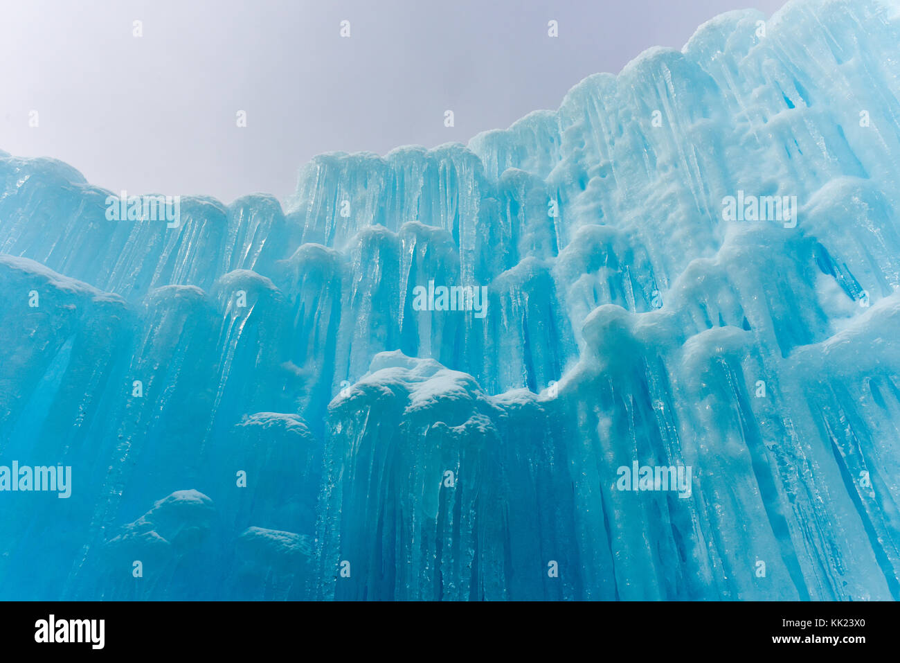 Translucent blue icicles in a frozen ice wall Stock Photo - Alamy