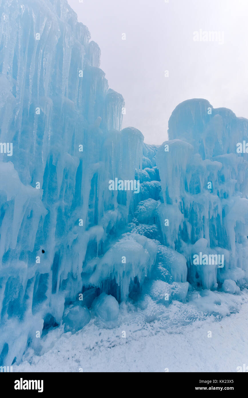 Translucent blue icicles in a frozen ice wall Stock Photo - Alamy