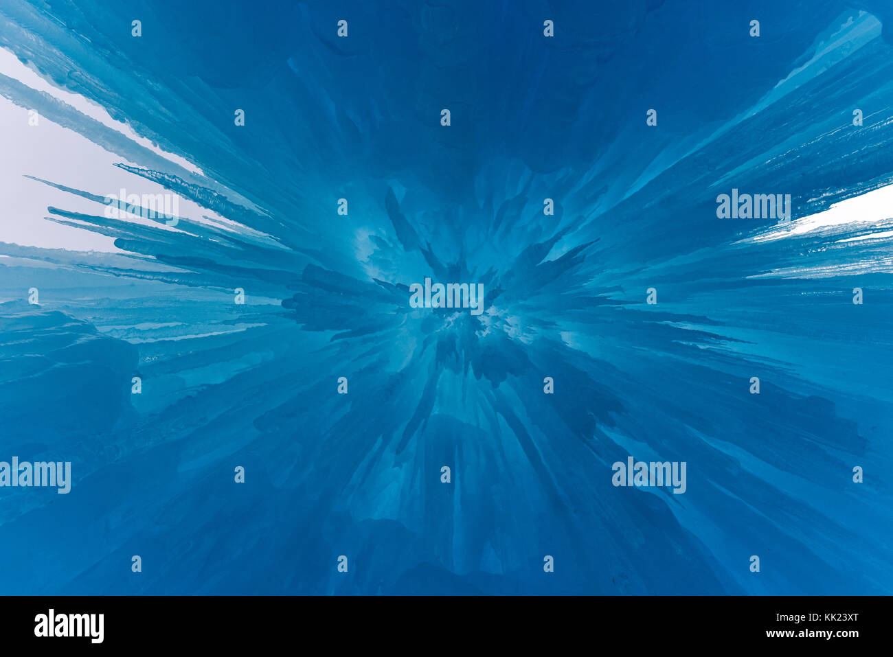 Translucent blue icicles in a frozen ice wall Stock Photo - Alamy