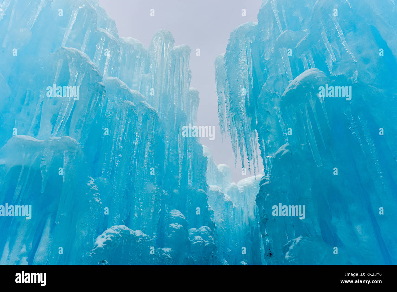 Translucent blue icicles in a frozen ice wall Stock Photo - Alamy