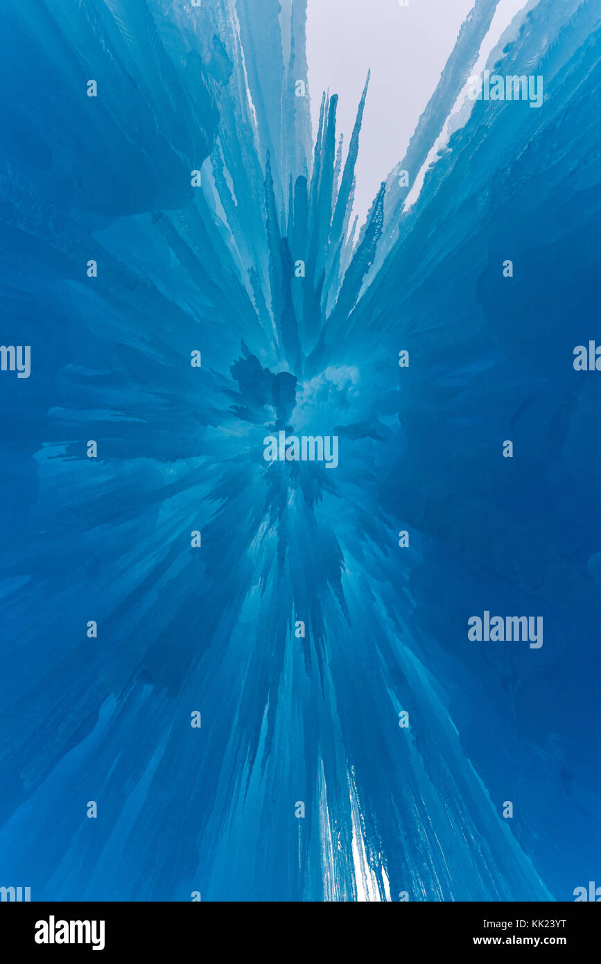 Translucent blue icicles in a frozen ice wall Stock Photo - Alamy