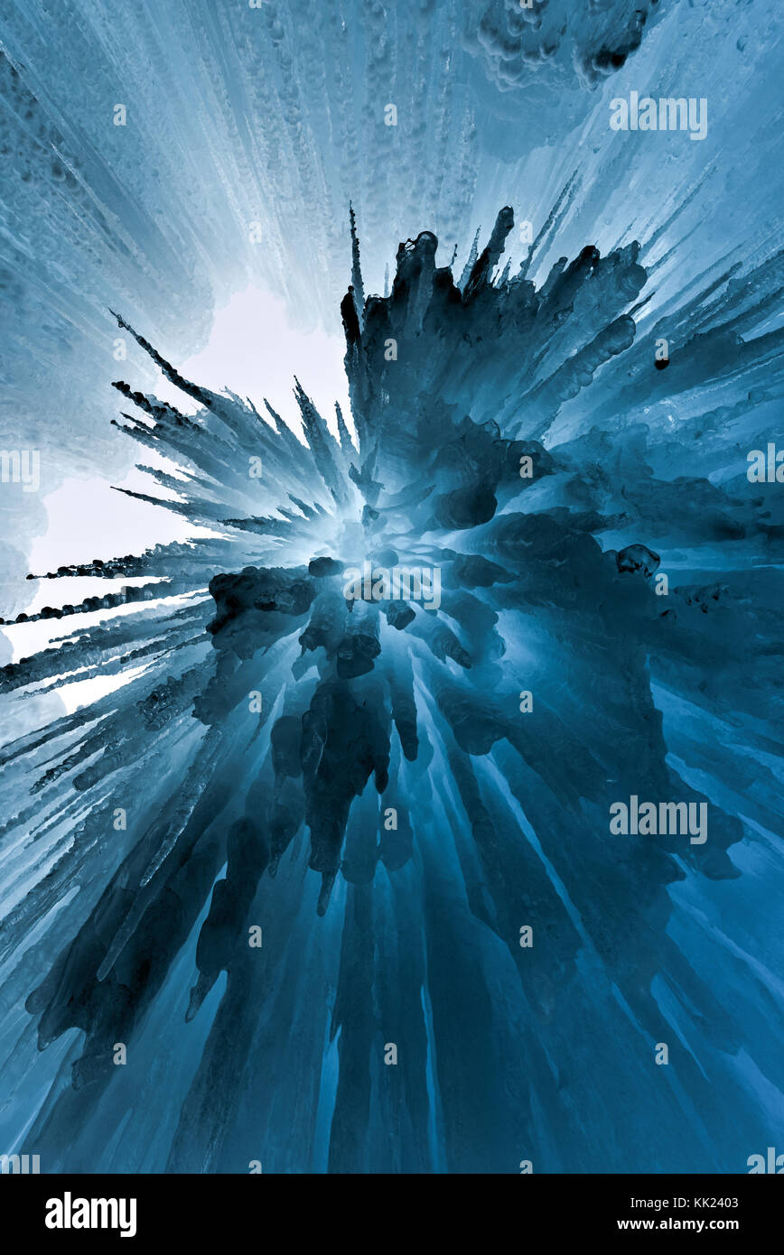 Translucent blue icicles in a frozen ice wall Stock Photo - Alamy