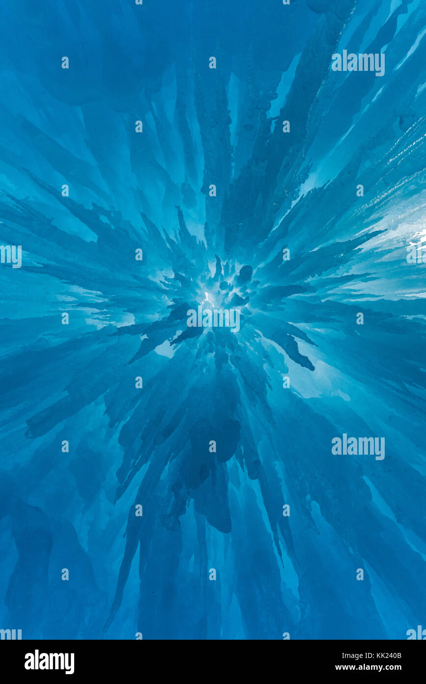 Translucent blue icicles in a frozen ice wall Stock Photo - Alamy