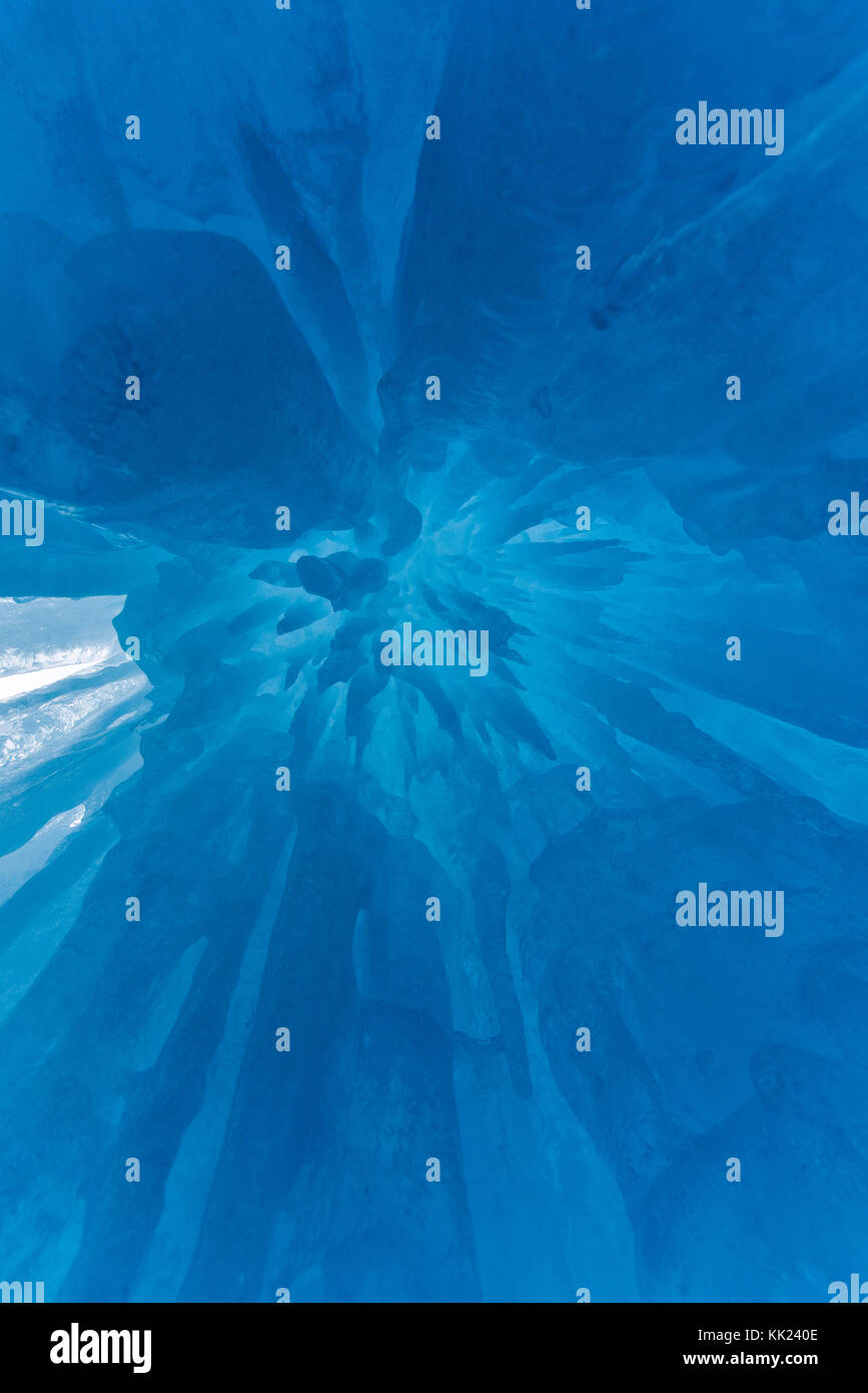 Translucent blue icicles in a frozen ice wall Stock Photo - Alamy