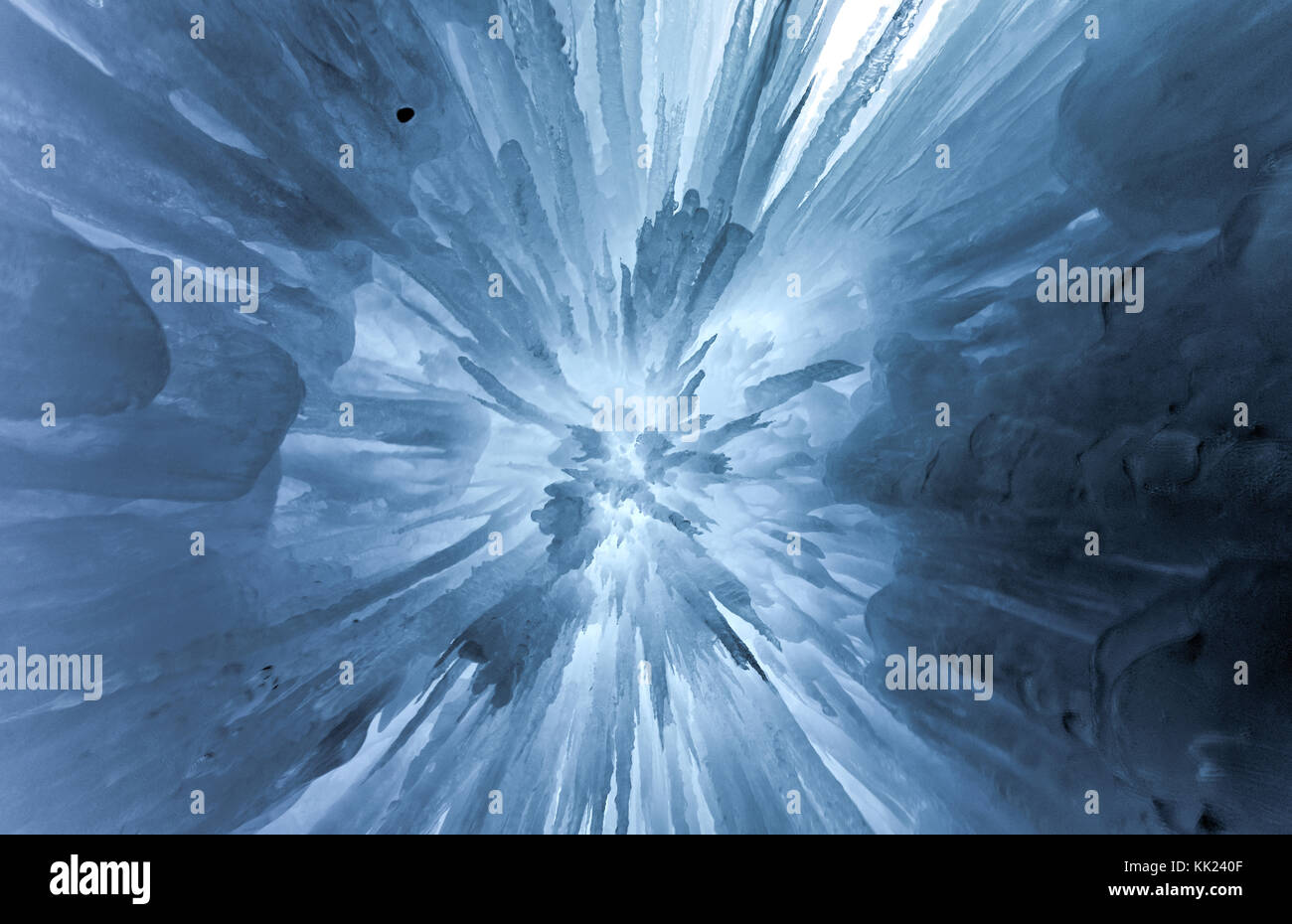 Translucent blue icicles in a frozen ice wall Stock Photo - Alamy