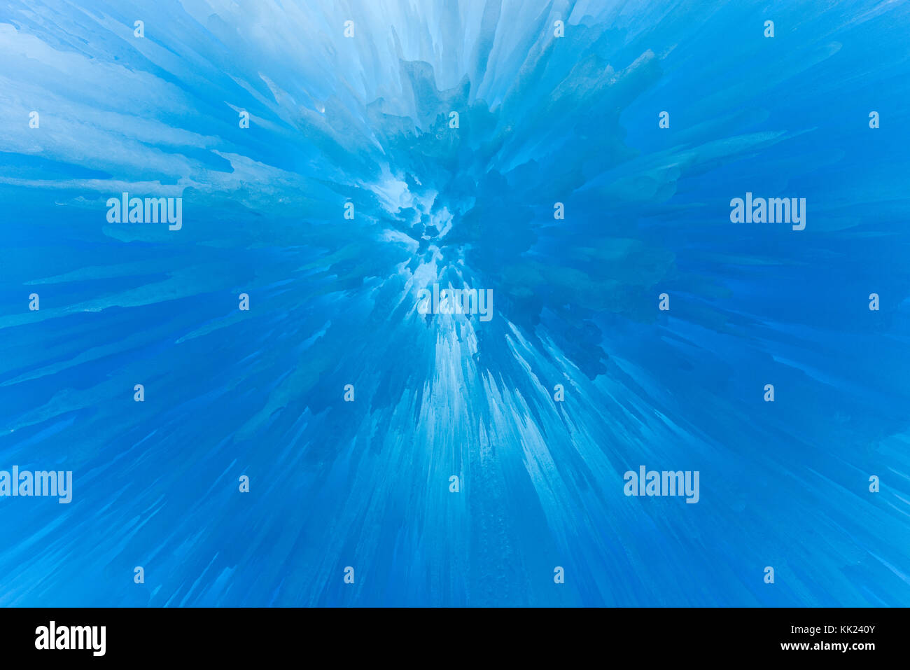 Translucent blue icicles in a frozen ice wall Stock Photo - Alamy